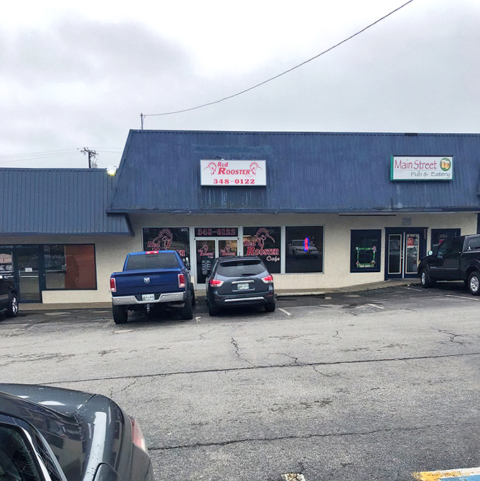 The blue-roofed beacon of breakfast bliss. Red Rooster Cafe's exterior may be humble, but those cars in the lot tell the real story.