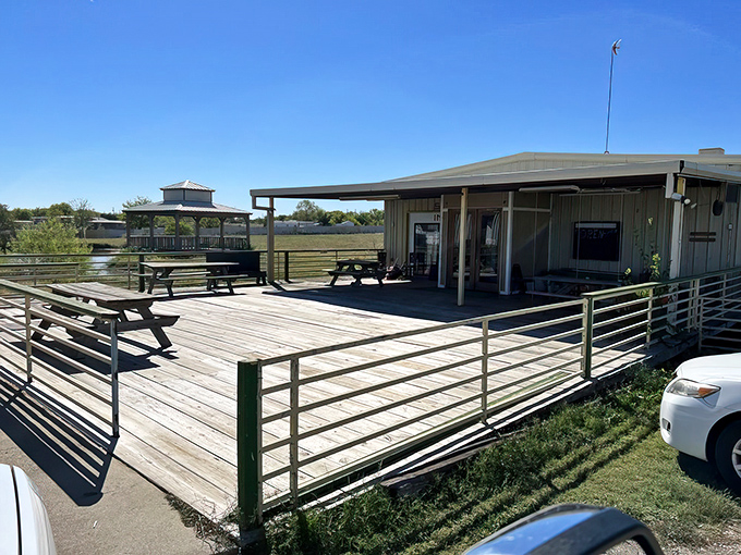 Inside, red-checkered tablecloths and Coca-Cola memorabilia create that perfect "I've just walked into someone's oversized kitchen" feeling that promises authentic comfort.