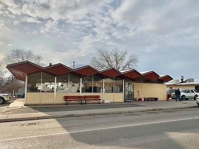 The classic red-trimmed exterior with vintage Coca-Cola bench says everything you need to know&mdash;unpretentious, welcoming, and ready to feed you properly.