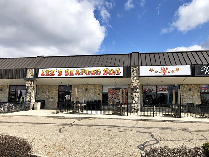 The stone facade and bold signage of Lee's Seafood Boil promises coastal treasures in Columbus. No need for ocean views when flavor is the real destination.