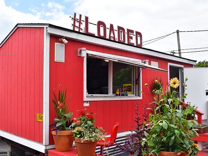 The fire-engine red food cart stands like a beacon of culinary promise, drawing hungry pilgrims from across Oregon to its flavorful sanctuary.