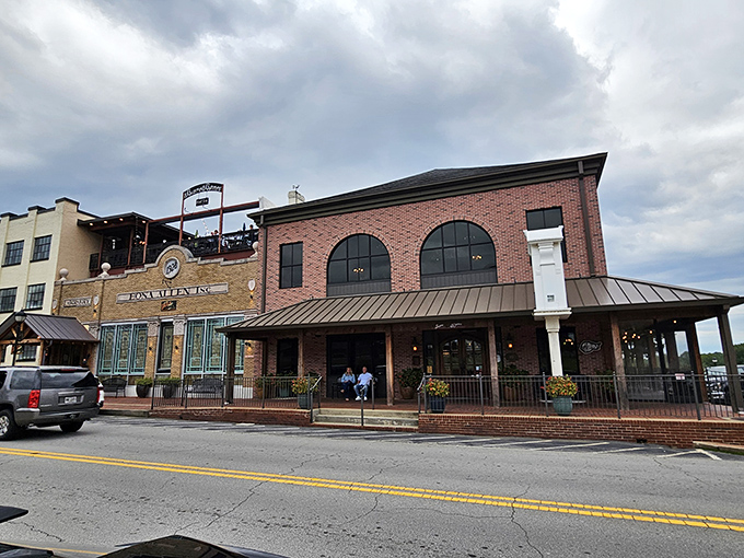 Brick and character define Bare Bones' exterior in downtown Buford, where culinary magic happens behind those unassuming walls.