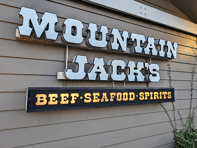 The unassuming exterior of Mountain Jacks hides a carnivore's paradise within. Like finding a treasure chest disguised as a garden shed.