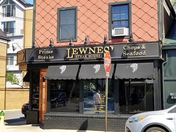 The unassuming exterior of Lewnes' Steakhouse in Annapolis hides a carnivore's paradise within. Classic diamond-patterned shingles and vintage awnings signal you've found the real deal.