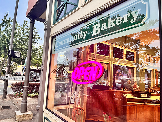 The pink and teal cornerstone of Little Rock's bakery scene beckons like a sugary lighthouse, complete with sidewalk seating for prime people-watching.