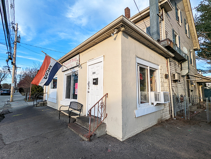 The unassuming exterior of Taqueria El Amigo might fool you, but that "TACOS" flag is actually the culinary equivalent of "Treasure Found Here!" 