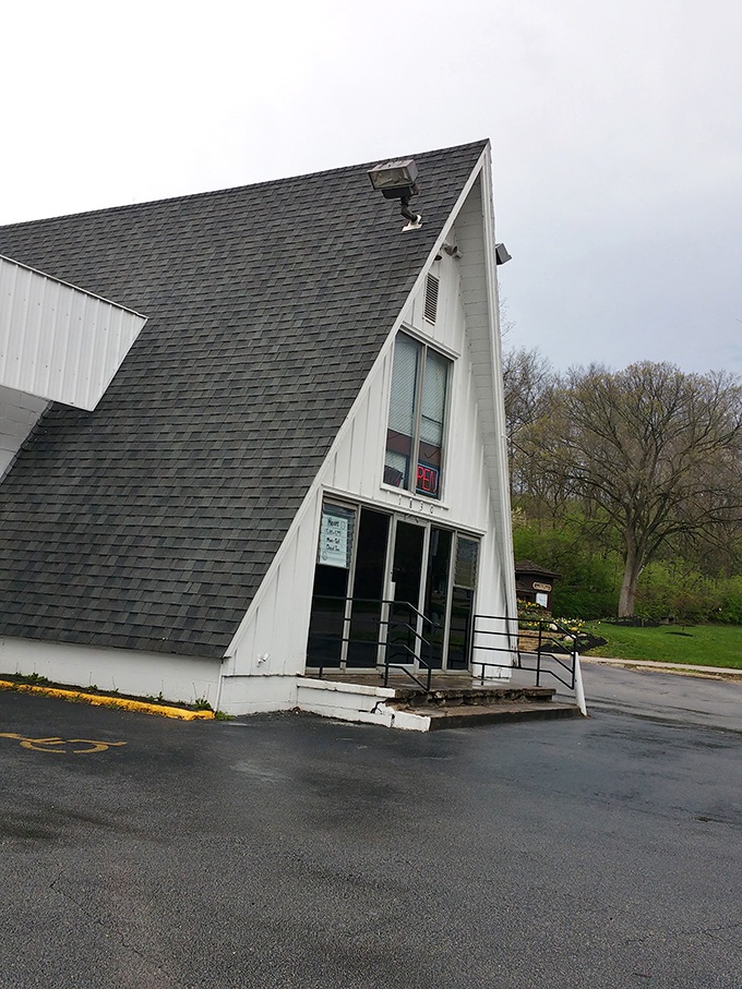 The iconic A-frame building of Mary Lou Donuts stands like a sugary lighthouse, beckoning carb enthusiasts from miles around.