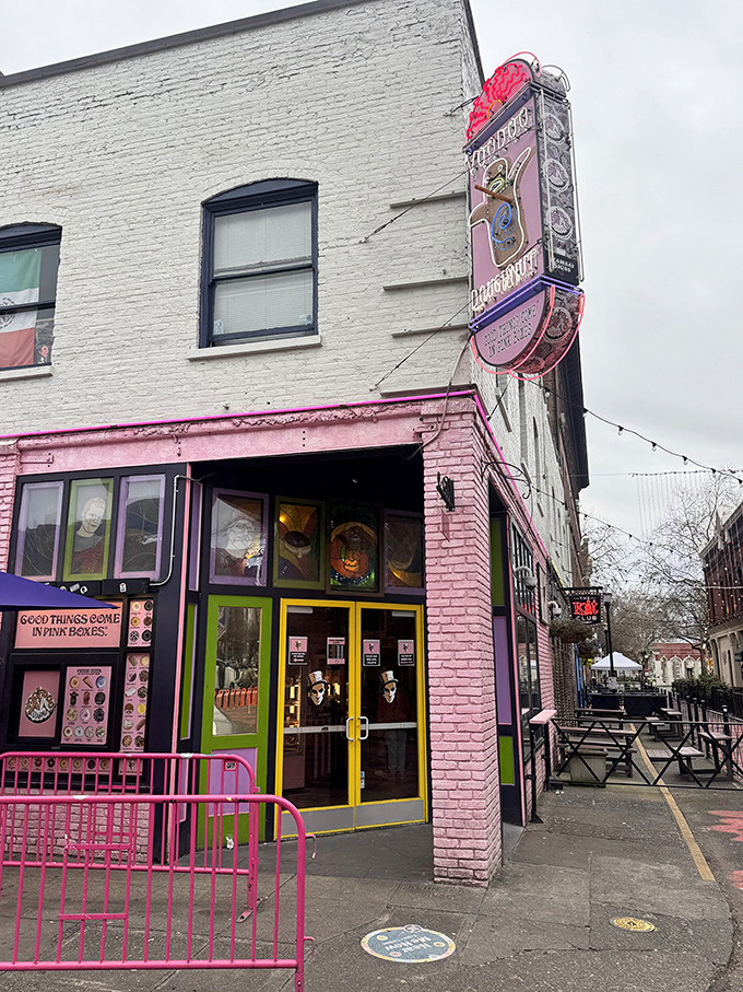 The corner where calories don't count. Voodoo Doughnut's iconic pink building stands like a sugar-powered beacon in downtown Portland, drawing pilgrims from across the globe.