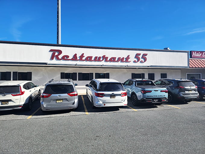 The unassuming storefront of Restaurant 55 proves once again that culinary treasures often hide in plain sight along Delaware's highways.