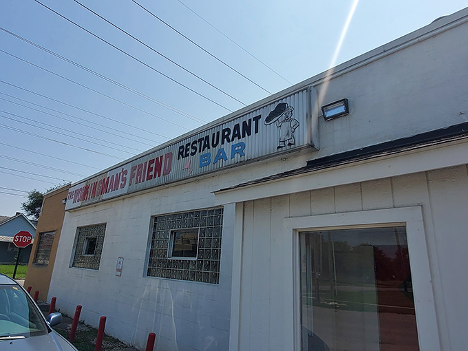 The unassuming exterior of Working Man's Friend stands like a time capsule on Indianapolis's west side, promising honest food without fanfare.