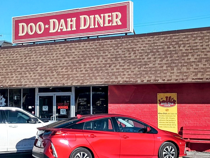 The bright red exterior of Doo-Dah Diner stands like a beacon of breakfast hope in Wichita, promising culinary salvation to the hungry and caffeine-deprived.