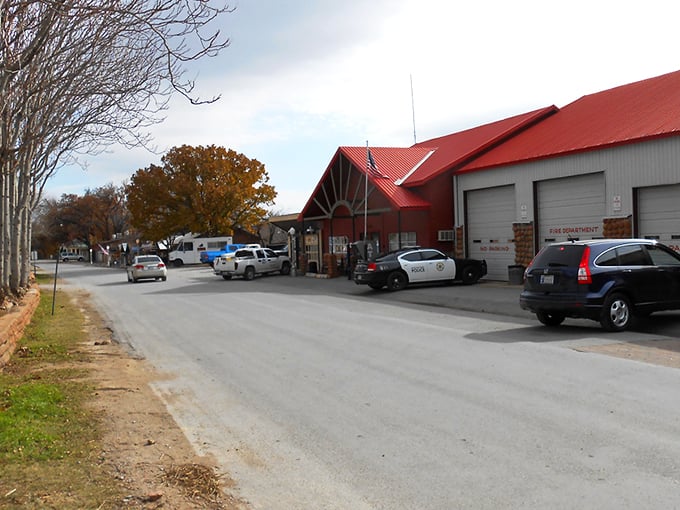 Main Street charm on full display! Medicine Park's cobblestone buildings and American flags create that perfect small-town vibe that makes you want to linger all afternoon.