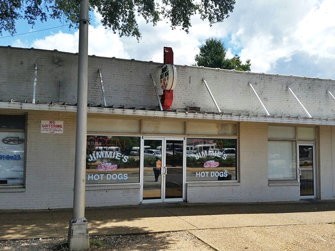 The unassuming exterior of Jimmie's Hot Dogs stands as a beacon of hope for hungry travelers – proof that culinary treasures often hide in plain sight.