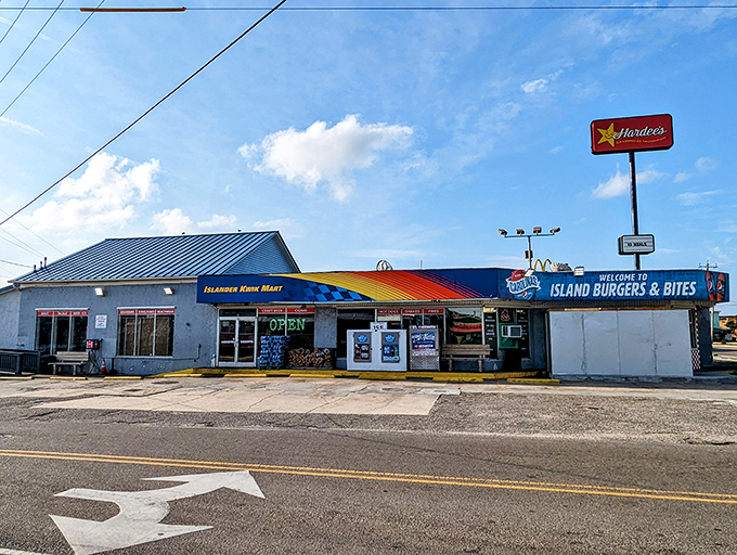 The blue beacon of burger bliss beckons beach-goers with its no-frills charm. Sometimes paradise comes with a side of simplicity.