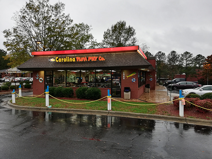 The red-trimmed roof of Carolina Fish Fry Co. beckons seafood lovers like a lighthouse calling ships to shore, even on rainy Garner afternoons.