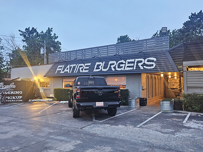 The unassuming exterior of Flatire Burgers belies the culinary magic happening inside. Like finding a diamond in a parking lot.