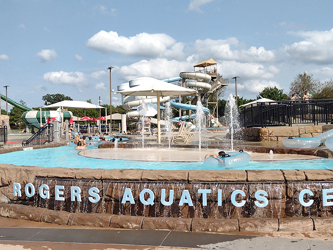 The aquatic wonderland where Arkansas goes to pretend it's oceanfront property. Those white and blue slides promise the kind of adrenaline rush usually reserved for tax audits.