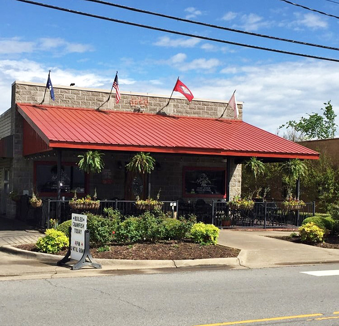 The unassuming brick exterior of The Faded Rose belies the culinary treasures within. That red awning might as well be a welcome mat to flavor town.