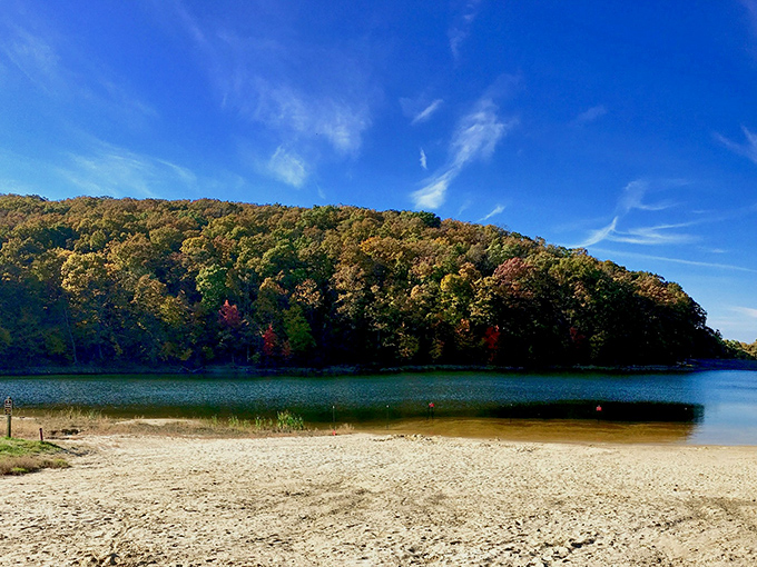 The path less traveled rewards you with this view &ndash; Greenbrier's shimmering lake reflecting the sky like nature's own infinity pool.