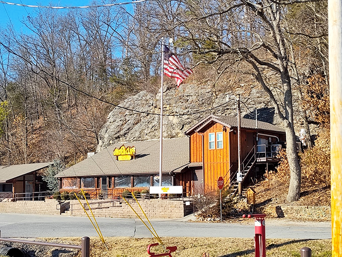 Where geology meets gastronomy! Undercliff Grill & Bar nestles against a towering limestone cliff, creating perhaps Missouri's most dramatic restaurant backdrop.