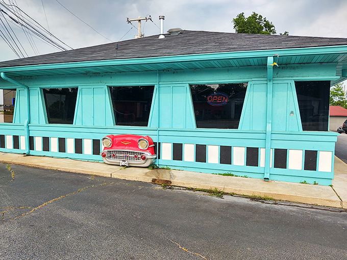 That unmistakable turquoise exterior isn't just a building&mdash;it's a time portal disguised as a diner. The Dairy Dip's vintage sign practically winks at passersby.