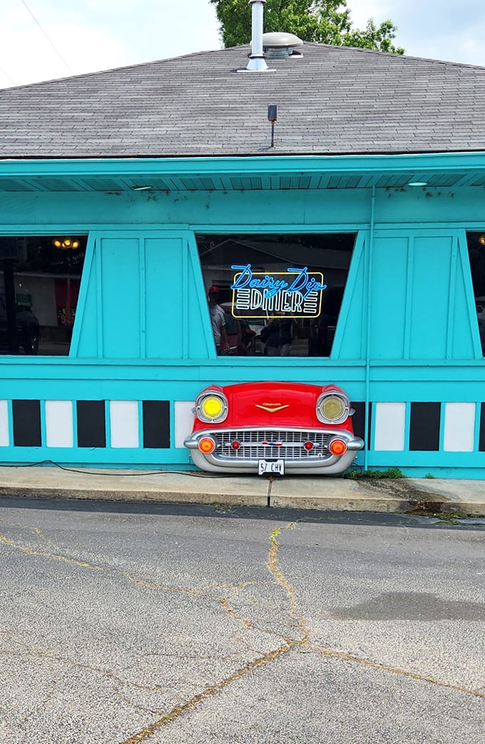 That unmistakable turquoise exterior isn't just a building&mdash;it's a time portal disguised as a diner. The Dairy Dip's vintage sign practically winks at passersby.