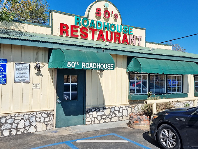 The classic roadside charm of 50's Road House beckons with its vibrant signage and green awnings&mdash;a time portal disguised as a restaurant in Knights Ferry.