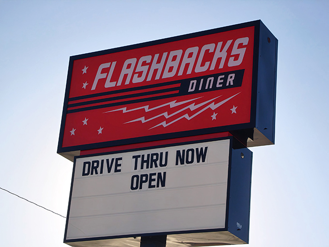 That iconic red sign against the Kansas sky promises more than just a meal&mdash;it's a ticket to simpler times when drive-ins ruled the roadside.