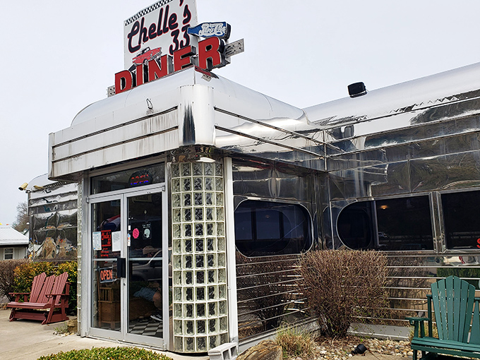 The gleaming stainless steel exterior of Chelle's 33 Diner stands like a time portal to the 1950s, complete with that iconic "33" beckoning hungry travelers.