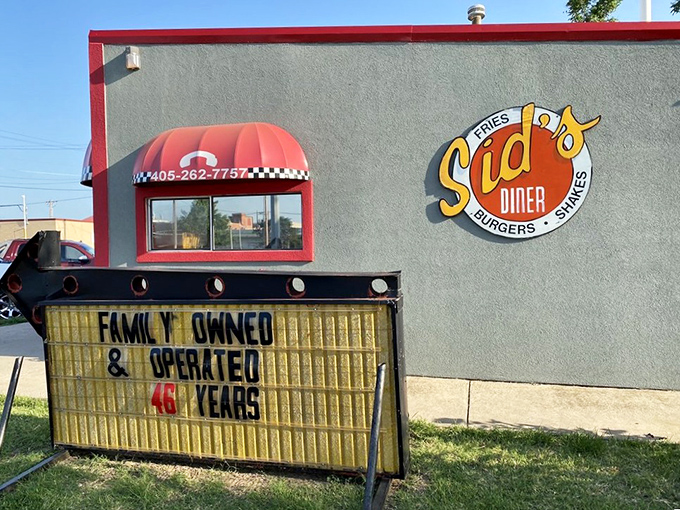 Route 66 nostalgia wrapped in a bright red awning. Sid's exterior promises simple pleasures that have stood the test of time.