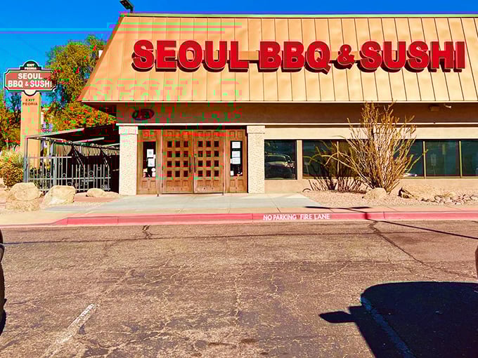 The bold red letters of Seoul BBQ & Sushi against the desert sky is like finding an oasis of flavor in Phoenix's beige landscape.