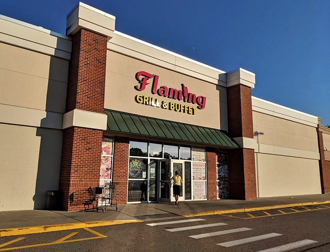 The humble brick facade of Flaming Grill & Buffet belies the culinary wonderland waiting inside. First rule of buffet club: never judge by the exterior.