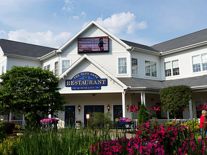 A serene koi pond welcomes visitors to Blue Gate, where tranquility begins before you even reach the front door.