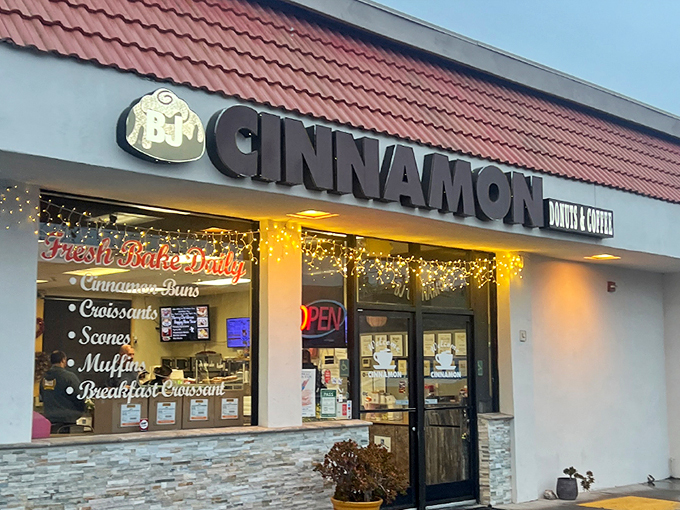 That bright sign isn't just a beacon&mdash;it's a promise of pastry perfection waiting inside this unassuming Folsom strip mall gem.