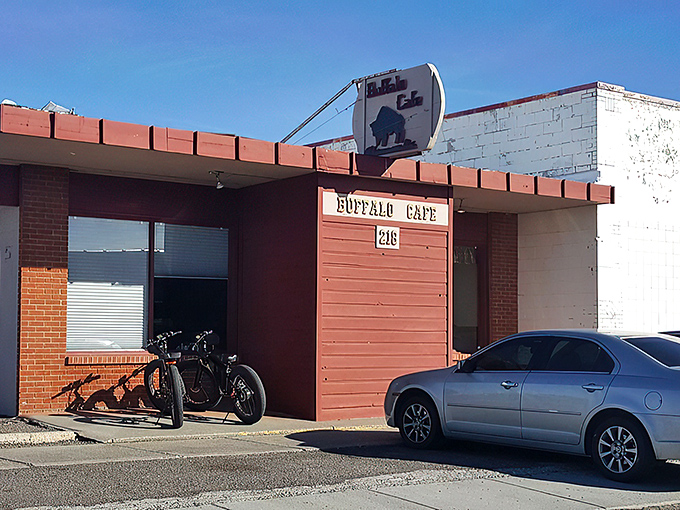 The unassuming exterior of Buffalo Cafe stands like a culinary speakeasy—only the initiated know what treasures await behind that humble brick facade.
