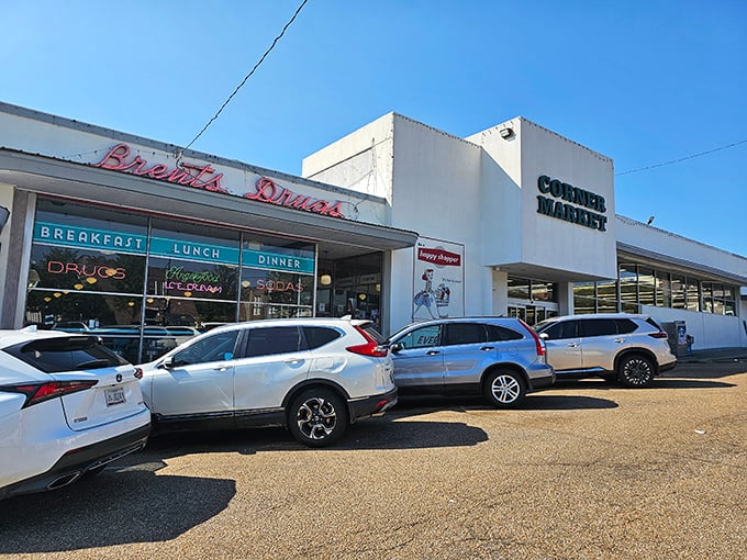 The classic storefront of Brent's Drugs beckons with its vintage neon sign, promising a taste of Mississippi nostalgia alongside your breakfast.