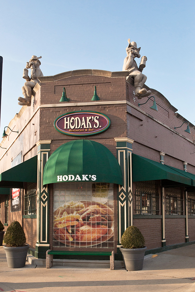 Those charming statues atop Hodak's aren't just decoration&mdash;they're guardians of the fried chicken galaxy, welcoming hungry pilgrims since 1962.