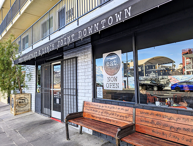 A modest storefront with a wooden bench that whispers, "The best culinary experiences often hide behind the simplest facades." Downtown Las Vegas's best-kept breakfast secret awaits.