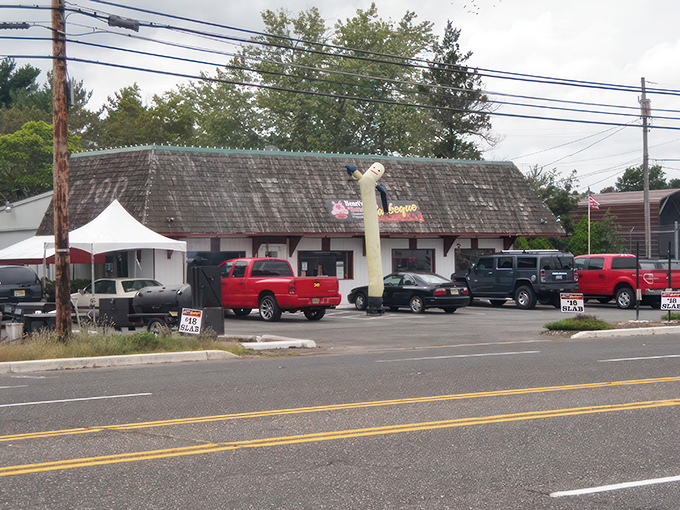 The unassuming exterior of Henri's Hotts Barbeque hides culinary treasures that would make even the most dedicated food pilgrim weep with joy.