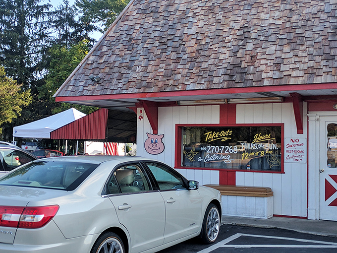 The unassuming exterior of Henri's Hotts Barbeque hides culinary treasures that would make even the most dedicated food pilgrim weep with joy.