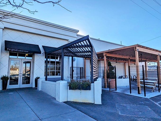 The wooden slat exterior of The Grove isn't just stylish&mdash;it's a preview of the warmth waiting inside, like a delicious secret the building can barely contain.