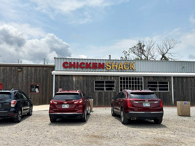 The unassuming exterior of Chicken Shack stands like a culinary lighthouse on Route 66, beckoning hungry travelers with its bold red-and-yellow sign.