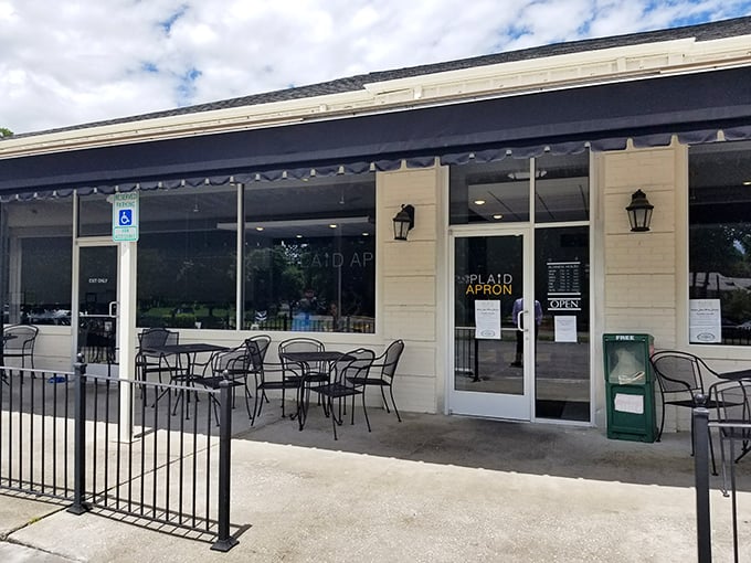 The unassuming exterior of The Plaid Apron belies the culinary magic happening inside. Like finding a secret clubhouse for breakfast enthusiasts.