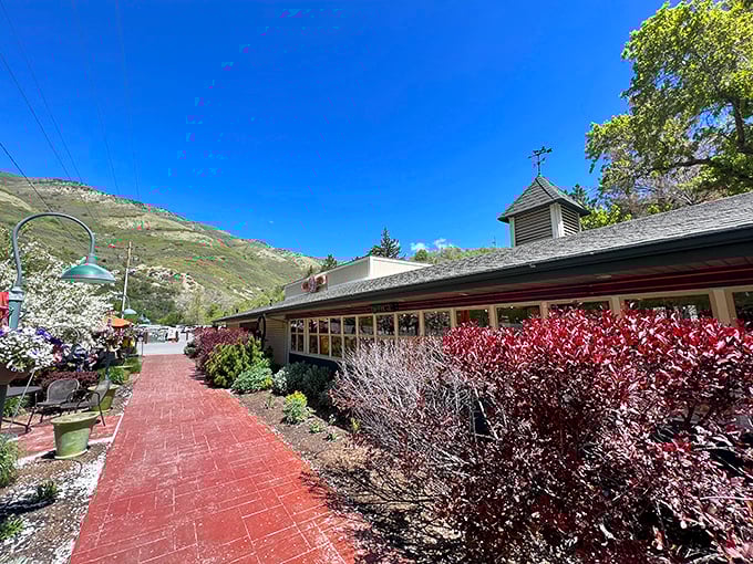 The red brick pathway to culinary paradise. Ruth's Diner nestles against Emigration Canyon's dramatic backdrop like a delicious secret waiting to be discovered.