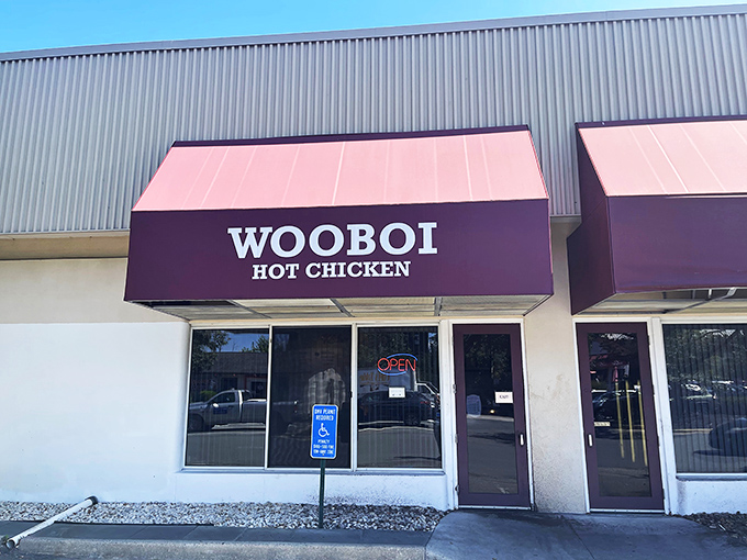 The burgundy awning beckons like a siren song to heat-seekers. WOOBOI's unassuming strip mall location hides culinary fire within.