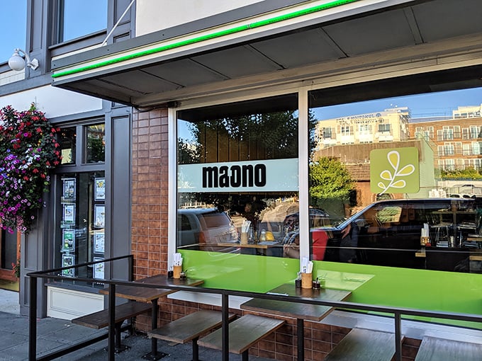The unassuming exterior of Ma'ono hides culinary treasures within, like finding a rare vinyl record in a plain sleeve. That bright green chicken sign is your beacon to fried chicken nirvana.