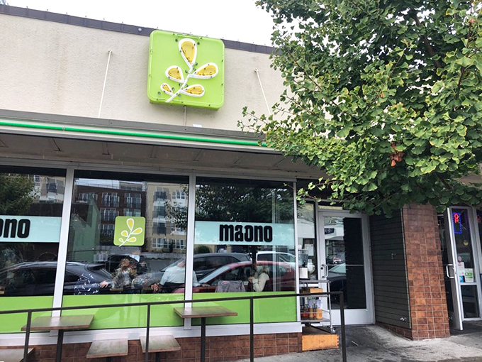 The unassuming exterior of Ma'ono hides culinary treasures within, like finding a rare vinyl record in a plain sleeve. That bright green chicken sign is your beacon to fried chicken nirvana.