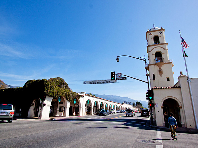 Downtown Ojai welcomes visitors with its iconic bell tower and Spanish Colonial architecture, framed by the majestic Topatopa Mountains that create the valley's famous "pink moment" at sunset.