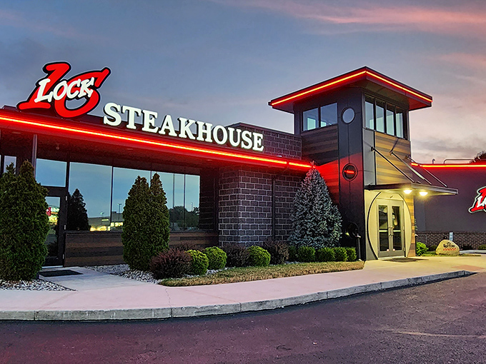 The modern tower entrance of Lock Sixteen stands like a culinary lighthouse, beckoning hungry travelers from across Ohio's highways to this steak sanctuary.