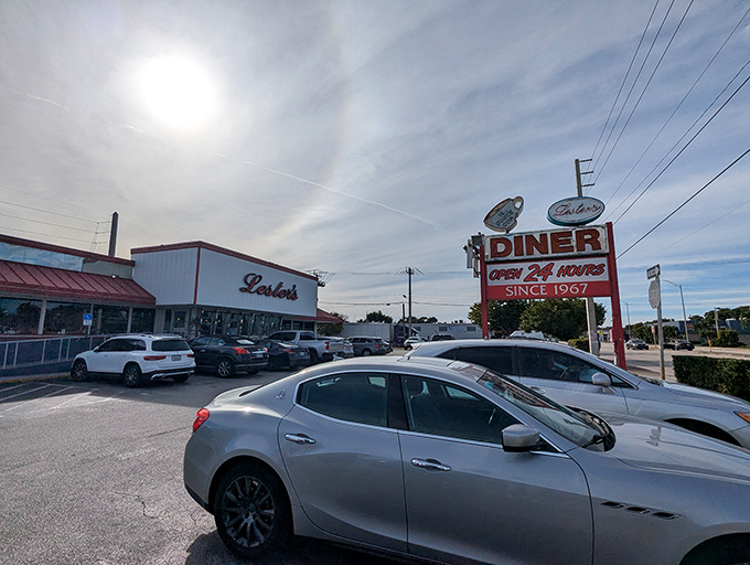 Lester's iconic red and white exterior stands like a beacon of breakfast hope on State Road 84, promising comfort food salvation since 1967.